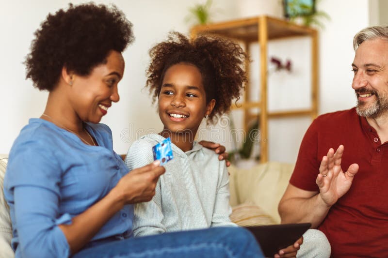 Family Using Digital Tablet and Credit Card Stock Image - Image of card ...