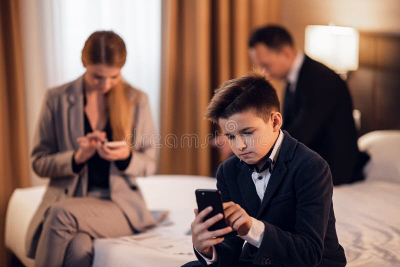 A Family Using Gadgets. Modern Technology Concept Stock Photo - Image ...