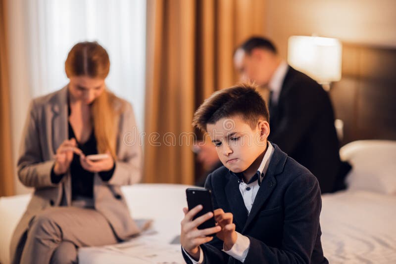A Family Using Gadgets. Modern Technology Concept Stock Photo - Image ...