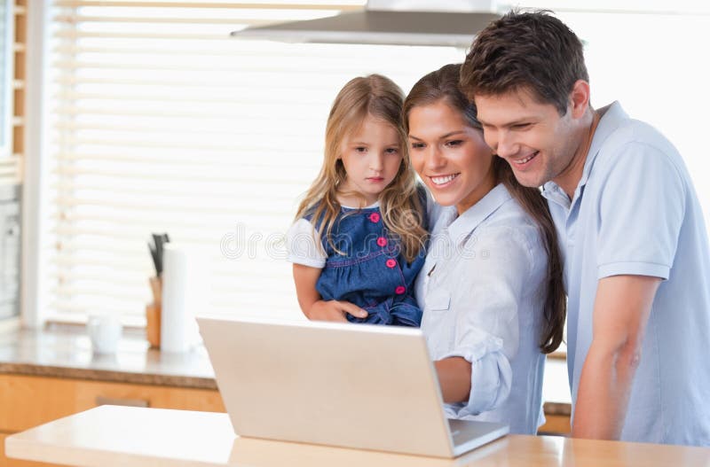 Family using computer stock photo. Image of girl, home - 31071104