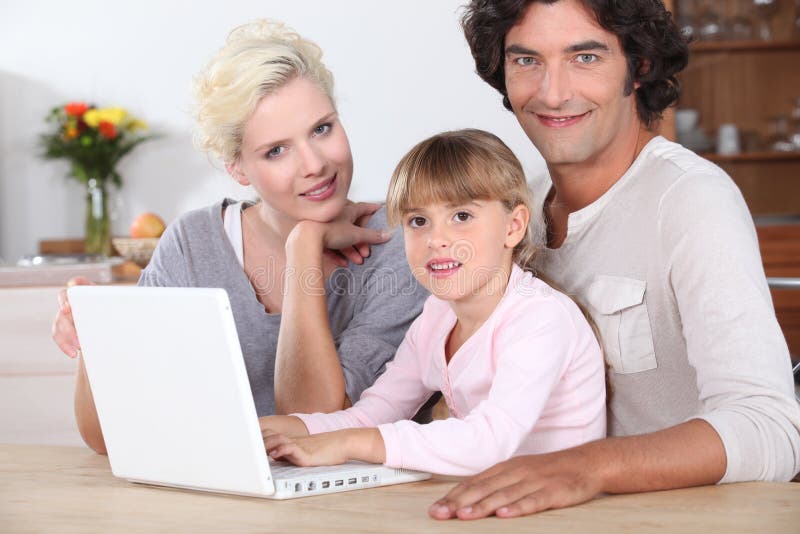 Family and computer stock image. Image of notebook, group - 18559587
