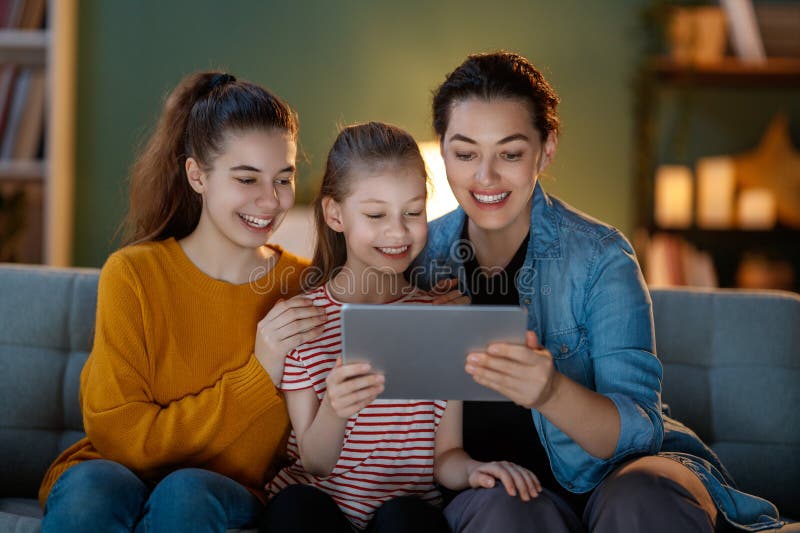 Family Using Tablet Pc Together Stock Photo - Image of home, love ...