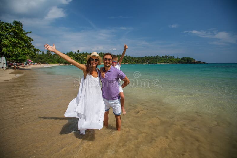 Family on Vacation at the Seashore of Indian Ocean Stock Image - Image ...