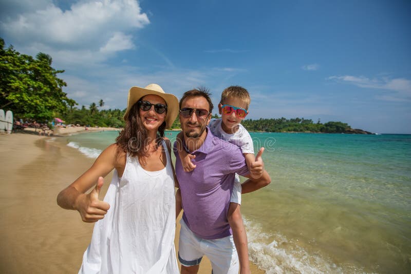 Family on Vacation at the Seashore of Indian Ocean Stock Image - Image ...