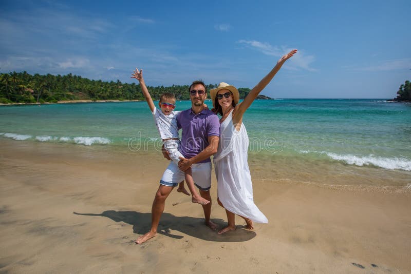 Family on Vacation at the Seashore of Indian Ocean Stock Image - Image ...