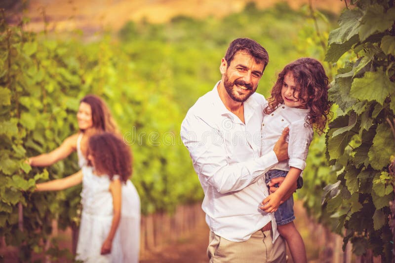 Family in the vineyard. stock photo. Image of child - 218892202