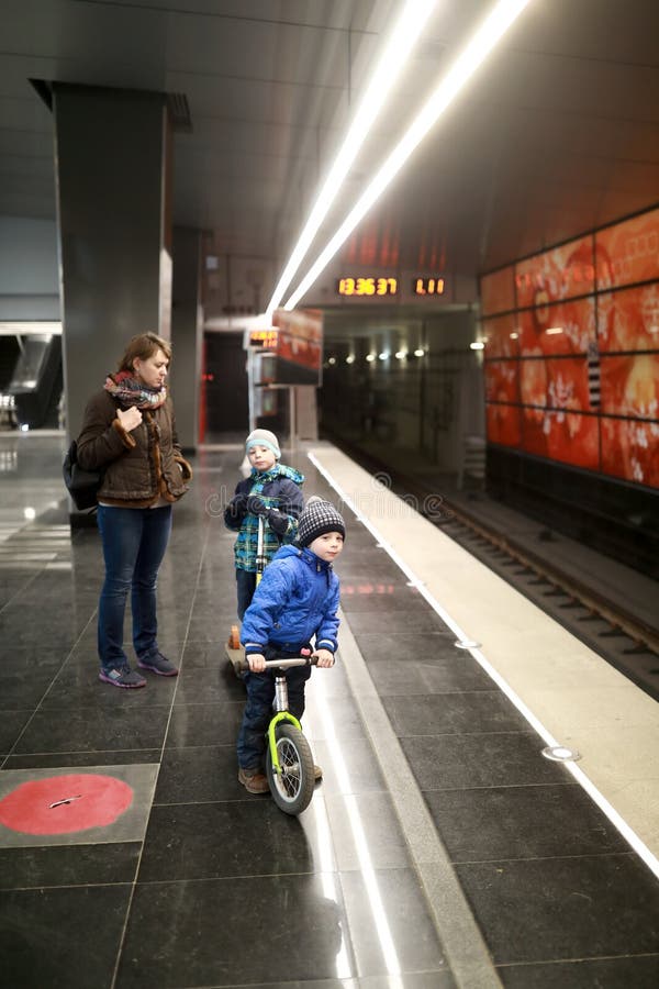 Family in subway train stock image. Image of public - 128277501