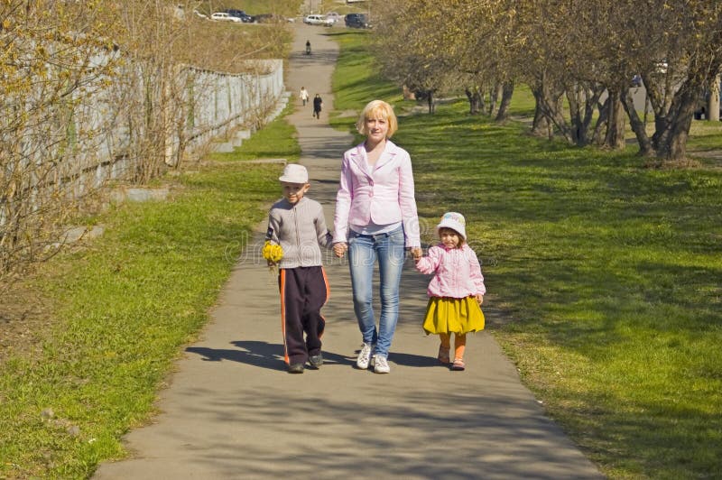 Family on walk stock image. Image of family, road, woman - 14303979