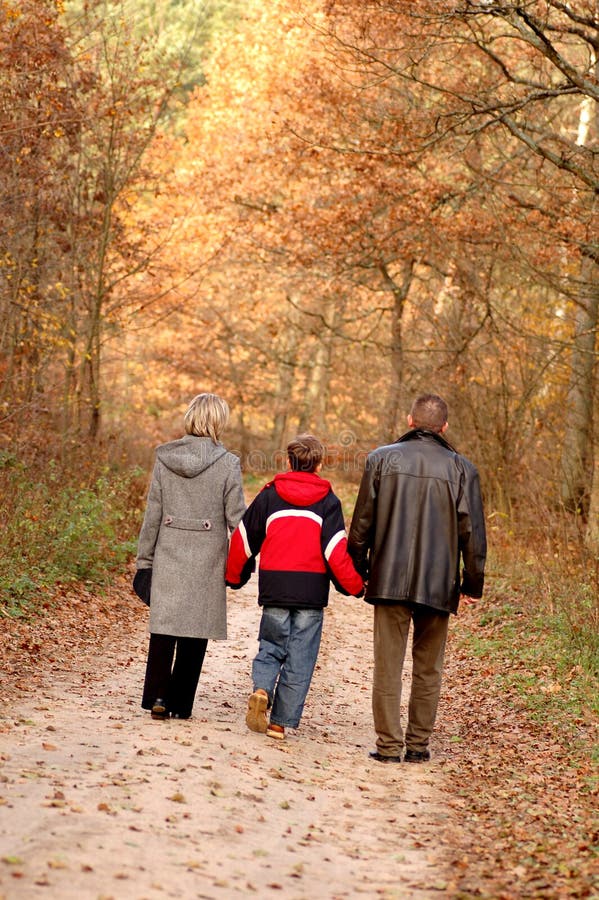 Family Walk on Long Straight Road, Way Towards Sunset Sun Stock Photo ...