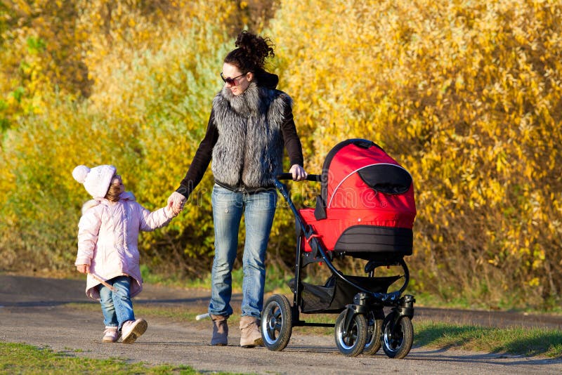 Family walk at sunset stock photo. Image of love, lifestyles - 20636566