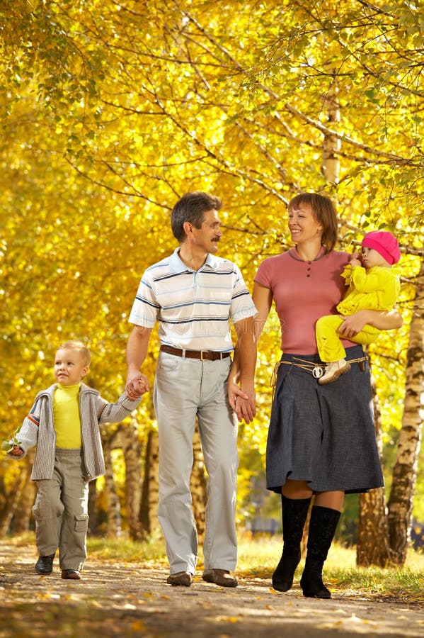 Parents and Grown Up Children on Walk Stock Photo - Image of scarf ...