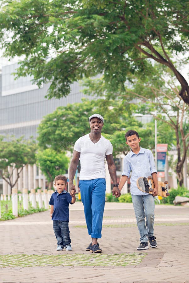 Family walk stock image. Image of black, family, parent - 40590065