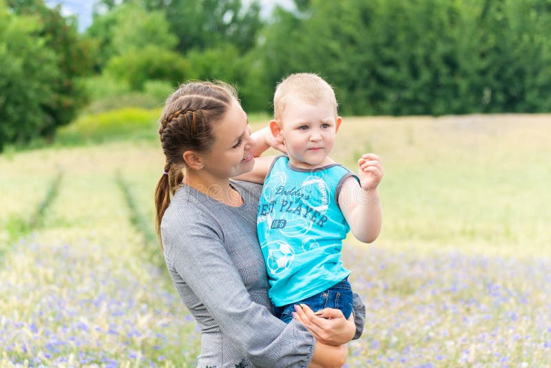 Family Walk in the Cornflower Field Stock Photo - Image of care ...