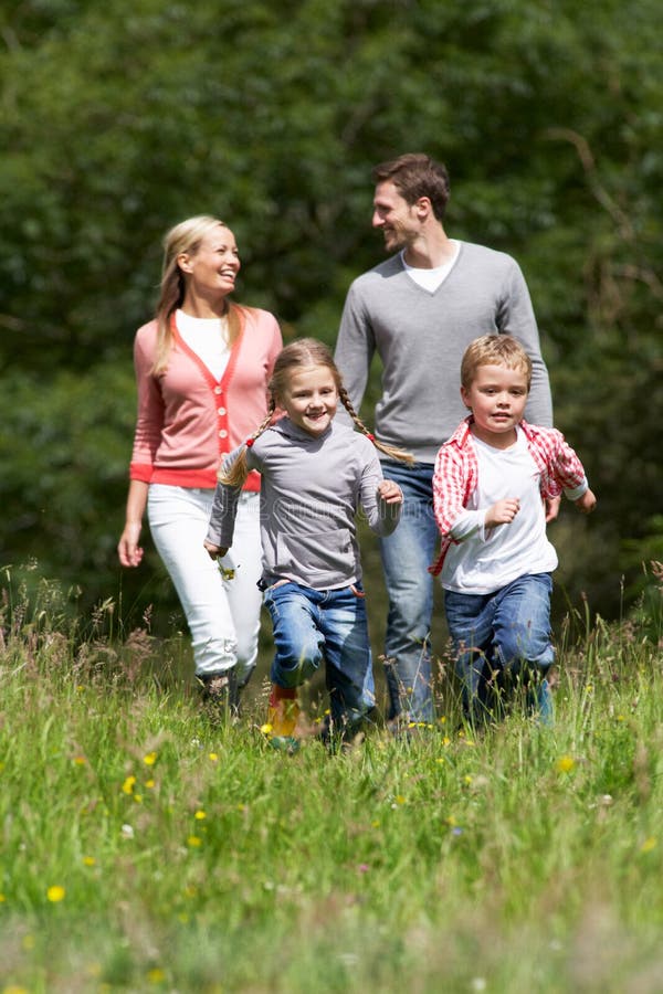 Family on Walk in Countryside Stock Image - Image of countryside, child ...