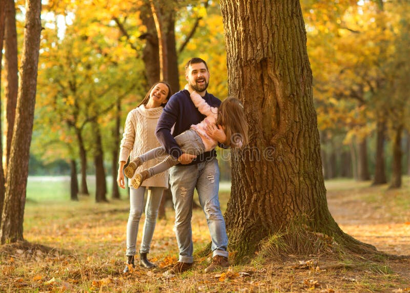 Family Walk in the Park, Happy at Sunset Stock Image - Image of happy ...