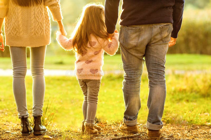 Family Walk in the Park, Happy at Sunset Stock Photo - Image of ...