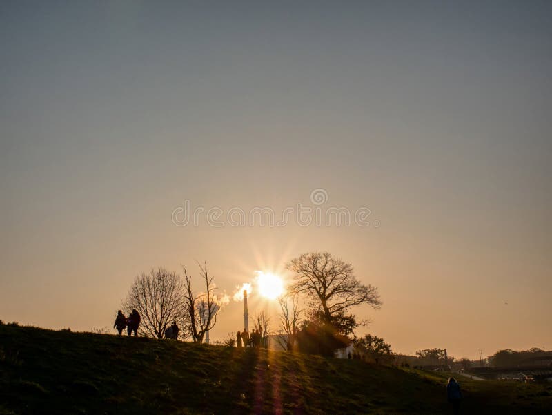 A Family Walk on a Sunday Afternoon in the Park Stock Photo - Image of ...