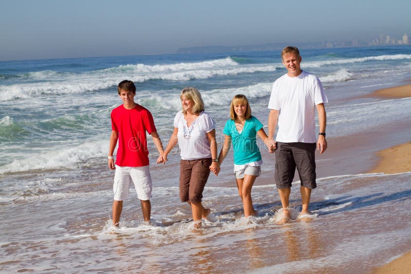 Smiling family on beach. stock photo. Image of girl, portrait - 2038224