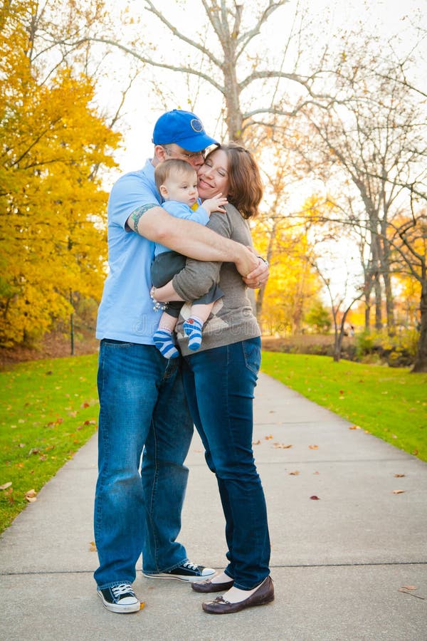 Family Walking Outside in the Fall Stock Image - Image of couple, adult ...