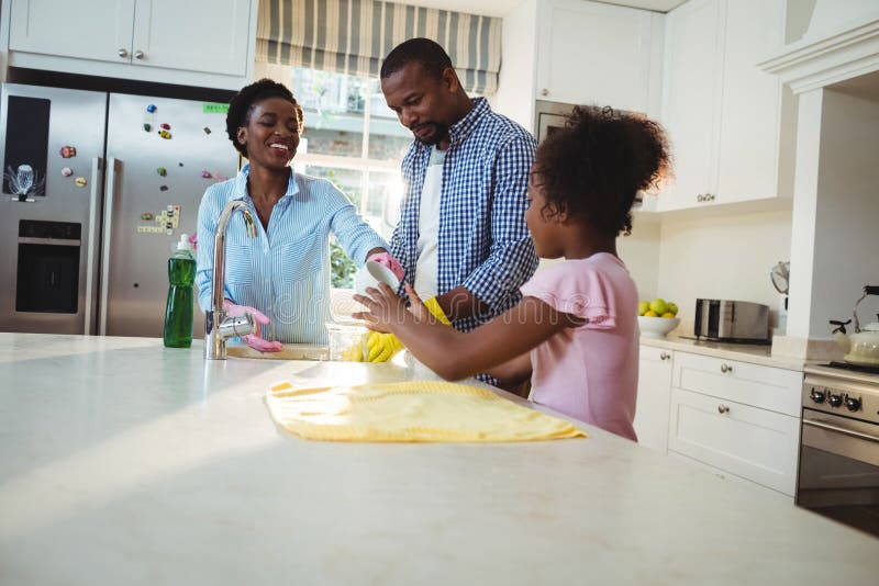 Family Washing Utensils in Kitchen Sink Stock Image - Image of family ...