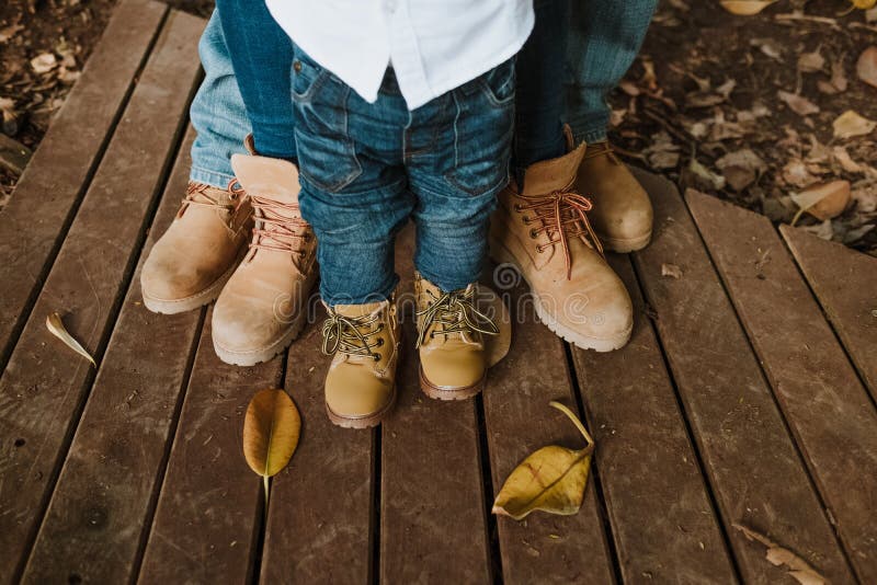 Family Wearing Similar Boots in the Autumn Stock Image - Image of happy ...