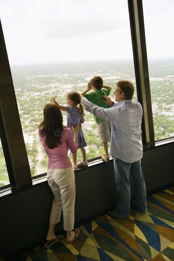Family at window. stock photo. Image of americas, woman - 2850376