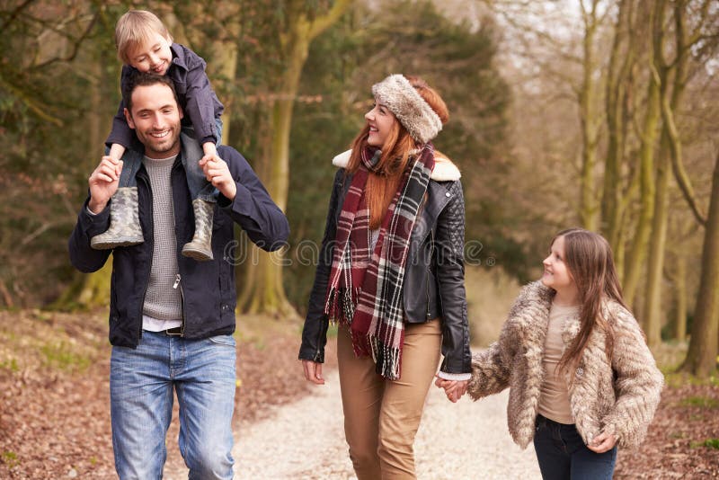 Family on Winter Countryside Walk Together Stock Image - Image of ...