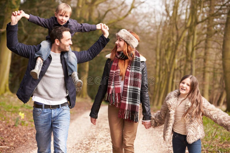 Family on Winter Countryside Walk Together Stock Image - Image of ...