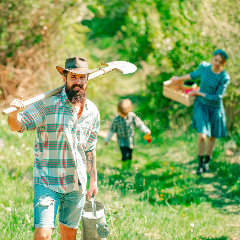 Family Working Together on Farm. Stock Photo - Image of crops ...