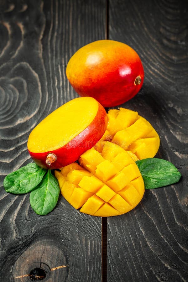 Famous Alphonso Mango Slices Over Wood Background,Selective Focus Image ...