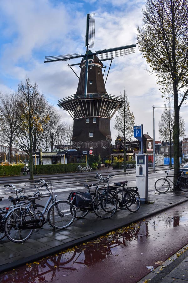 Famous De Gooyer Windmill with Side Walking Bikes, Amsterdam ...