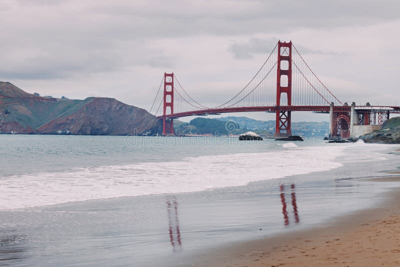 Famous Golden Gate Bridge on Cloudy Day Stock Image - Image of beach ...