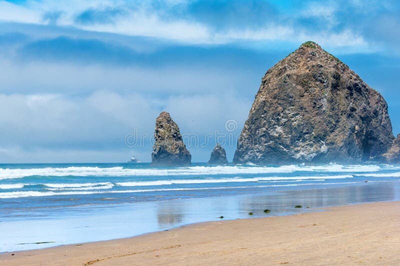 Famous Haystack Rock stock photo. Image of scenic, northwest - 141334136