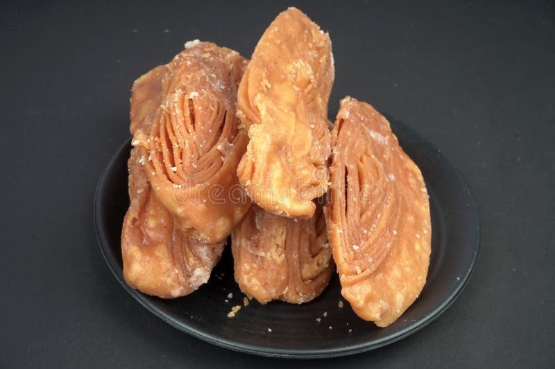 Famous Khaja of Puri in Black Plate Stock Image - Image of pastry ...