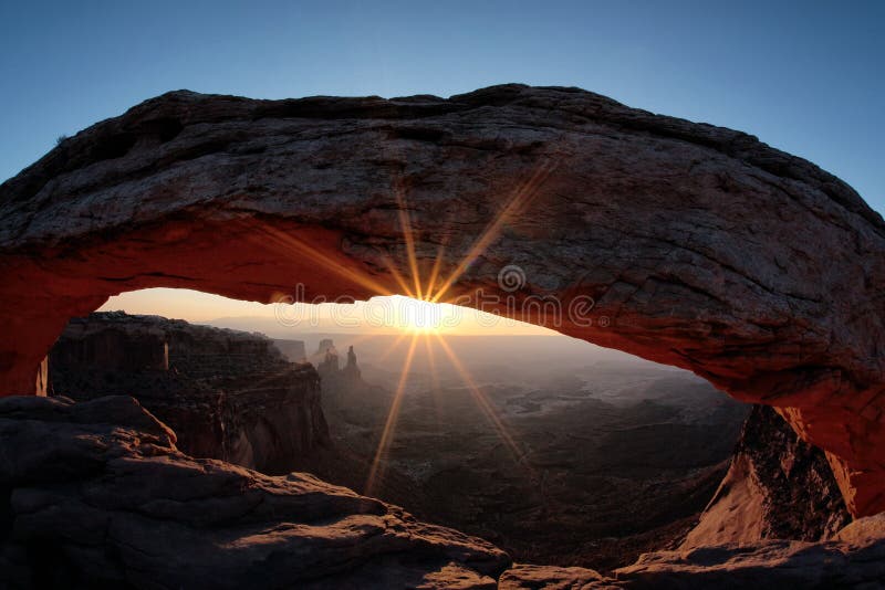 The Famous Sunrise at Mesa Arch Stock Photo - Image of travel, glowing ...