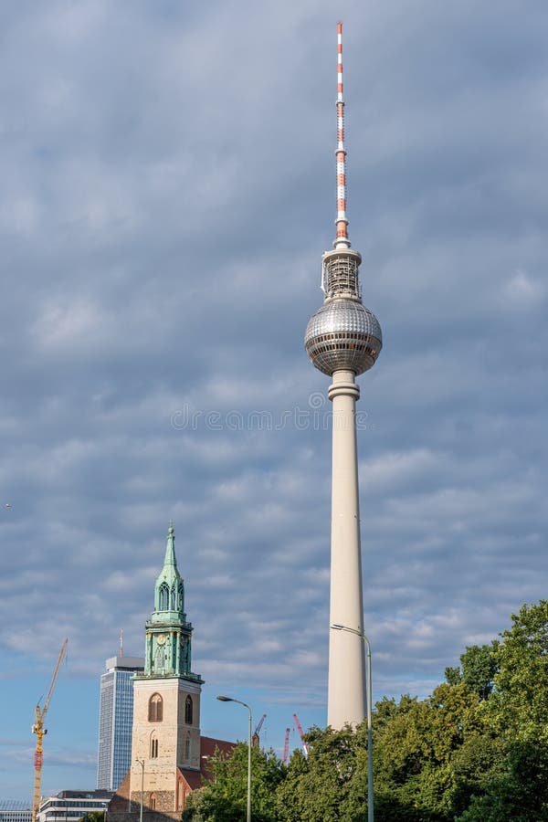 The Famous TV Tower in Berlin with the Tower of the Marienkirche Editorial Stock Photo - Image ...