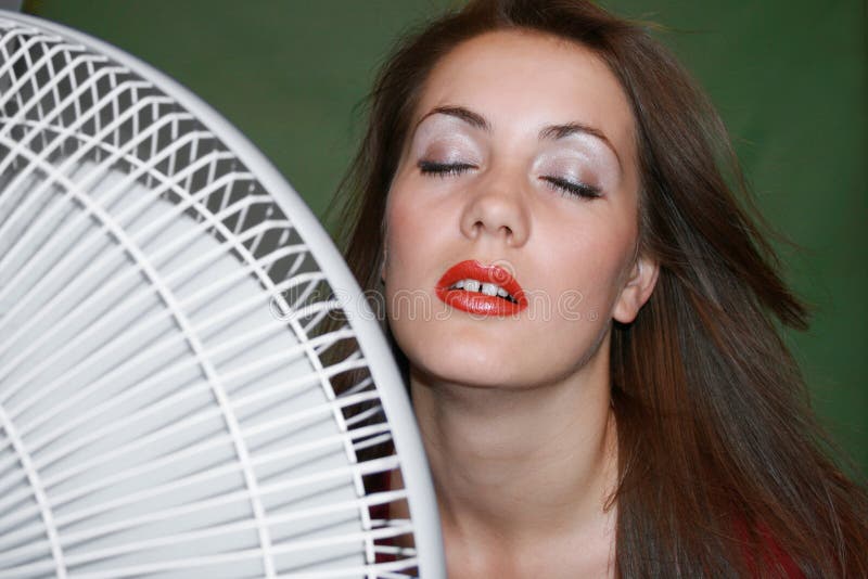Fan stock image. Image of brunette, emotion, blow, cooler - 3170033