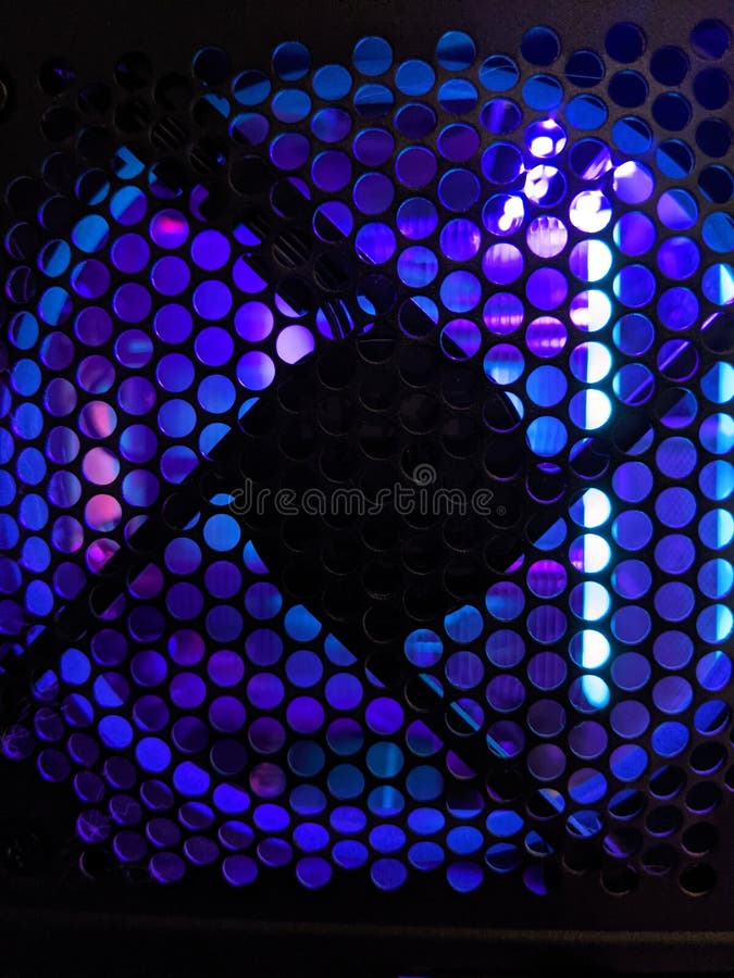 A Fan Inside the Computer, Covered with Mesh. Beautiful Lighting Stock ...
