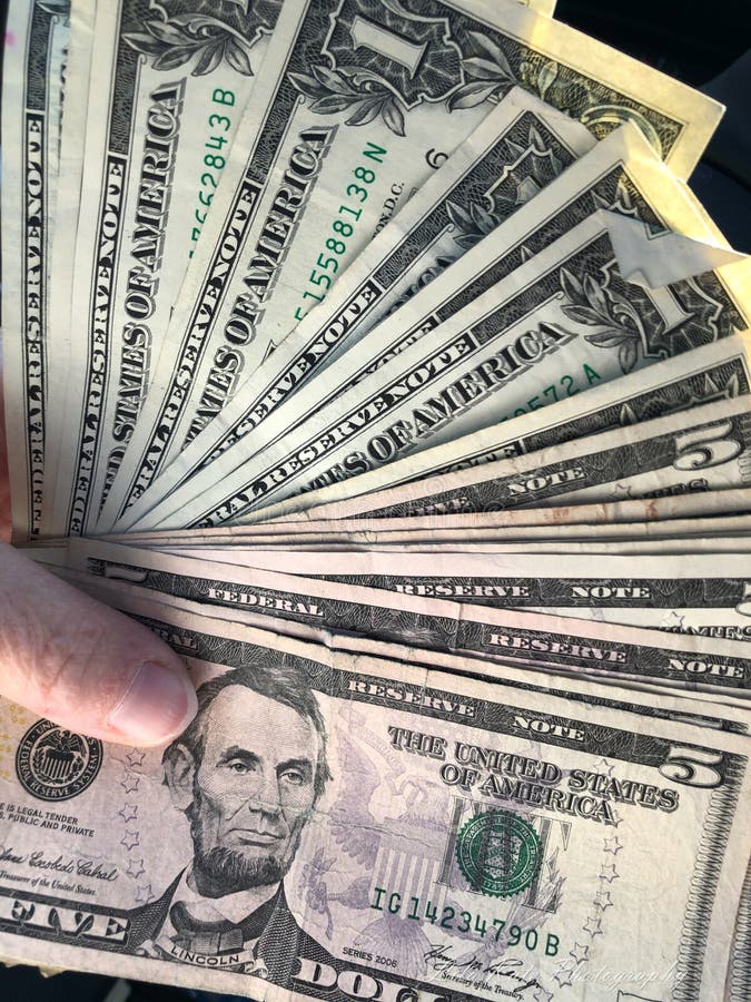A fan of money stock image. Image of bills, hand, newspaper - 317093207