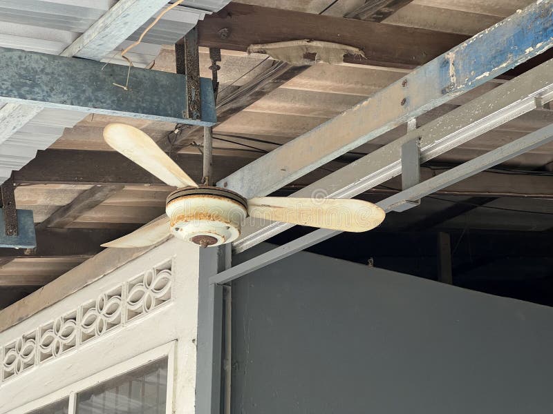 Fan and Old Vintage Fan on the Roof of the House Stock Image - Image of ...
