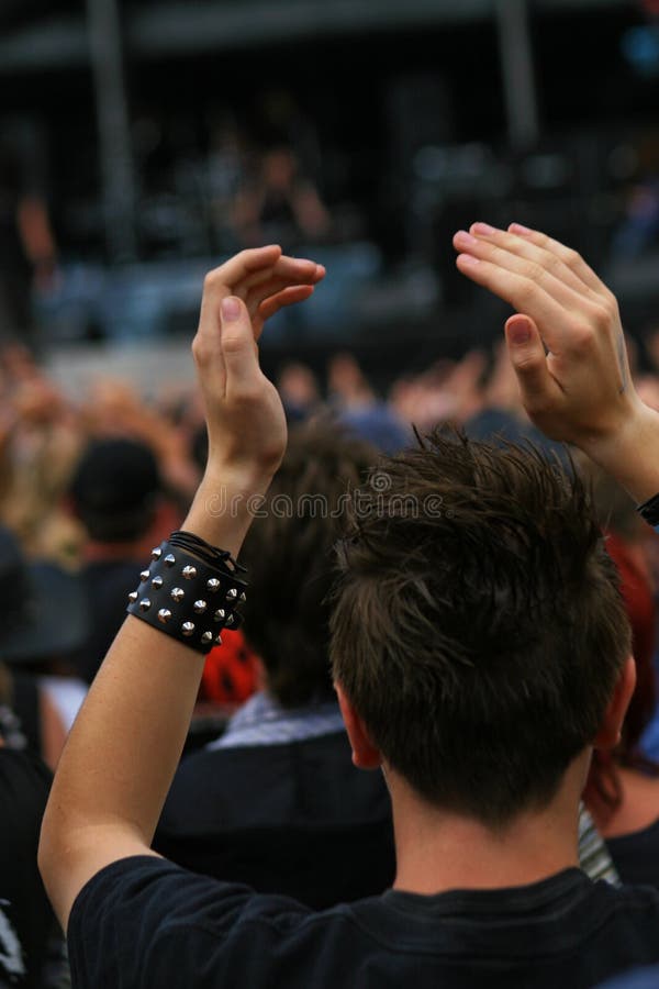 Fan at a rock concert stock image. Image of applause - 42938459