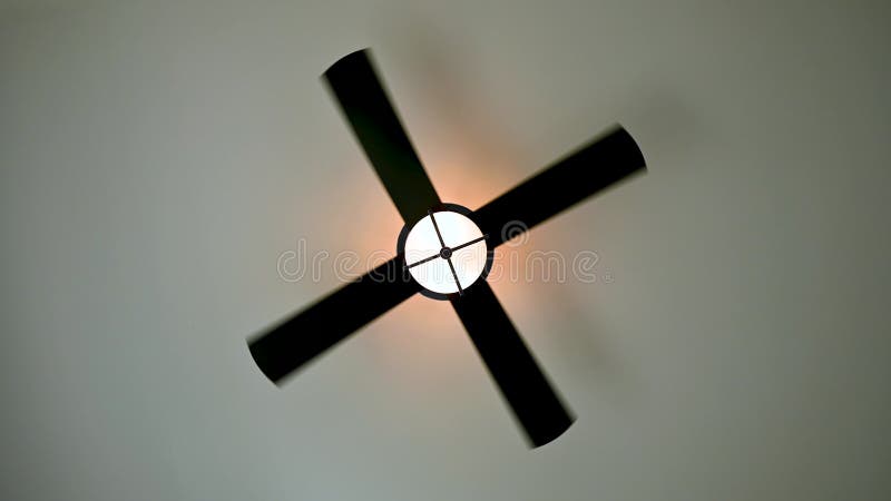 Ceiling Fan Spinning on Low Speed with Light on Stock Footage - Video ...