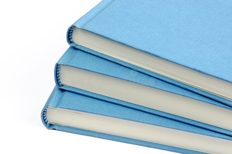 A Group of Blue Books in a Row on a White Background Stock Photo ...