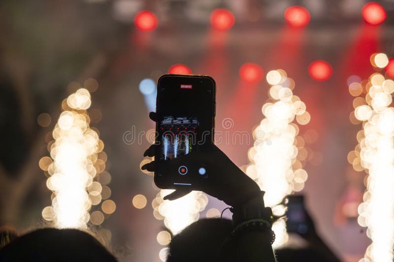 Fan Uses Cellphone To Record Concert Editorial Photography - Image of ...