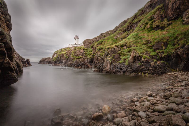 Fanad Head Lighthouse stock image. Image of light, cliffs - 51328035