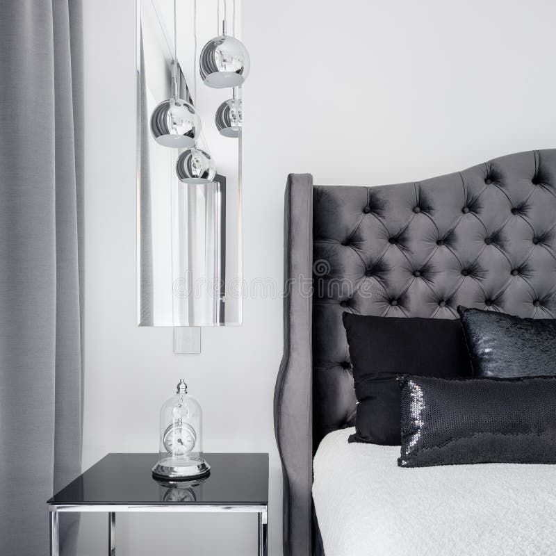 Fancy Bedside Table with Decoration Stock Photo - Image of chic ...