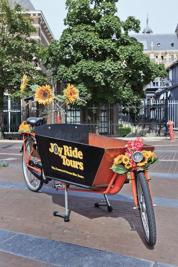Fancy Bike Decorated with Flowers in Amsterdam Editorial Image - Image ...