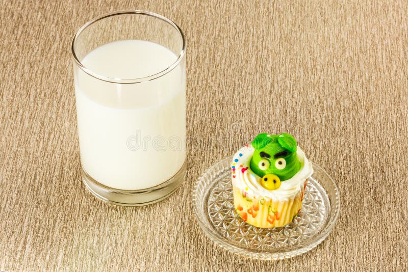 Fancy cupcake and milk stock image. Image of plate, sweet - 43922357