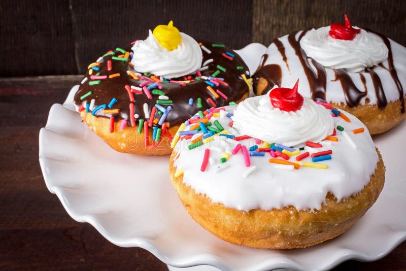 Fancy decorated doughnuts stock image. Image of icing - 33506453