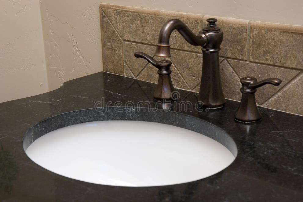 Fancy faucet stock image. Image of master, brown, restroom - 1928127